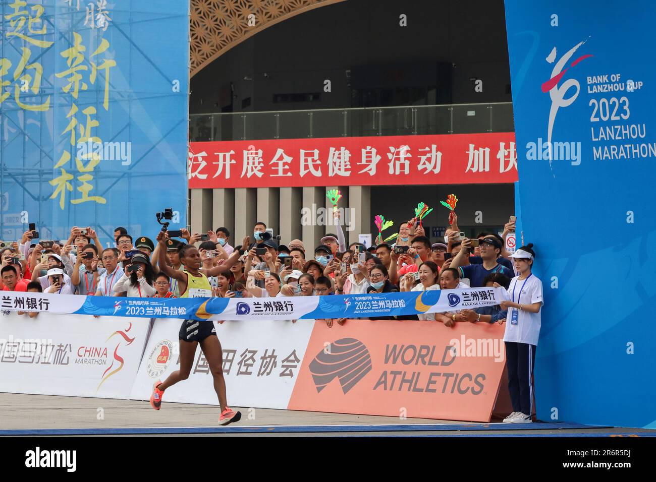 Lanzhou. 11th June, 2023. Letebrhan Haylay Gebreslasea of Ethiopia dashes to the finish line ...