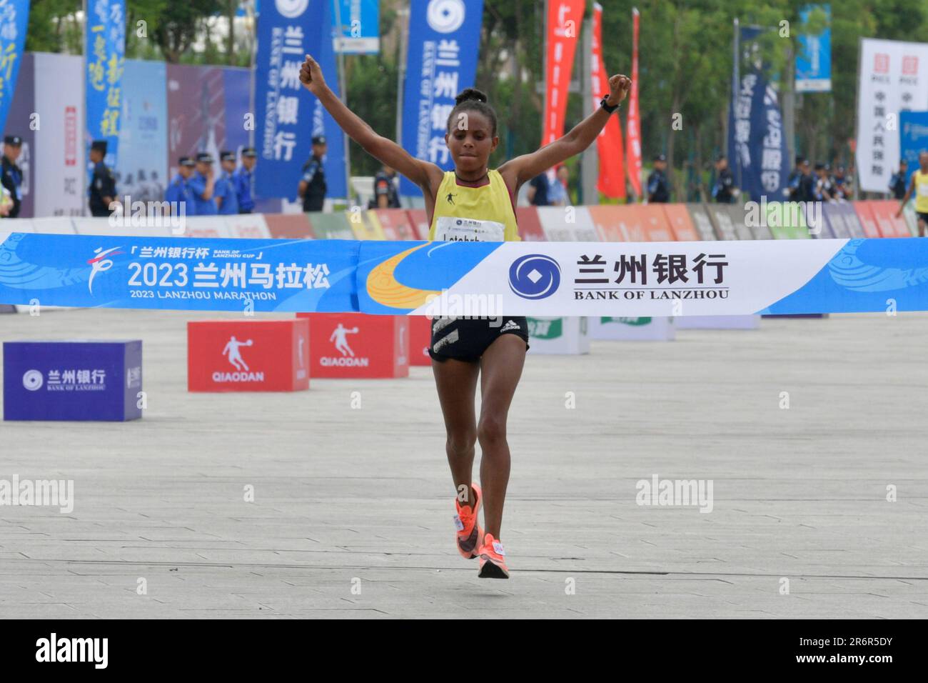 Lanzhou. 11th June, 2023. Letebrhan Haylay Gebreslasea of Ethiopia dashes to the finish line ...