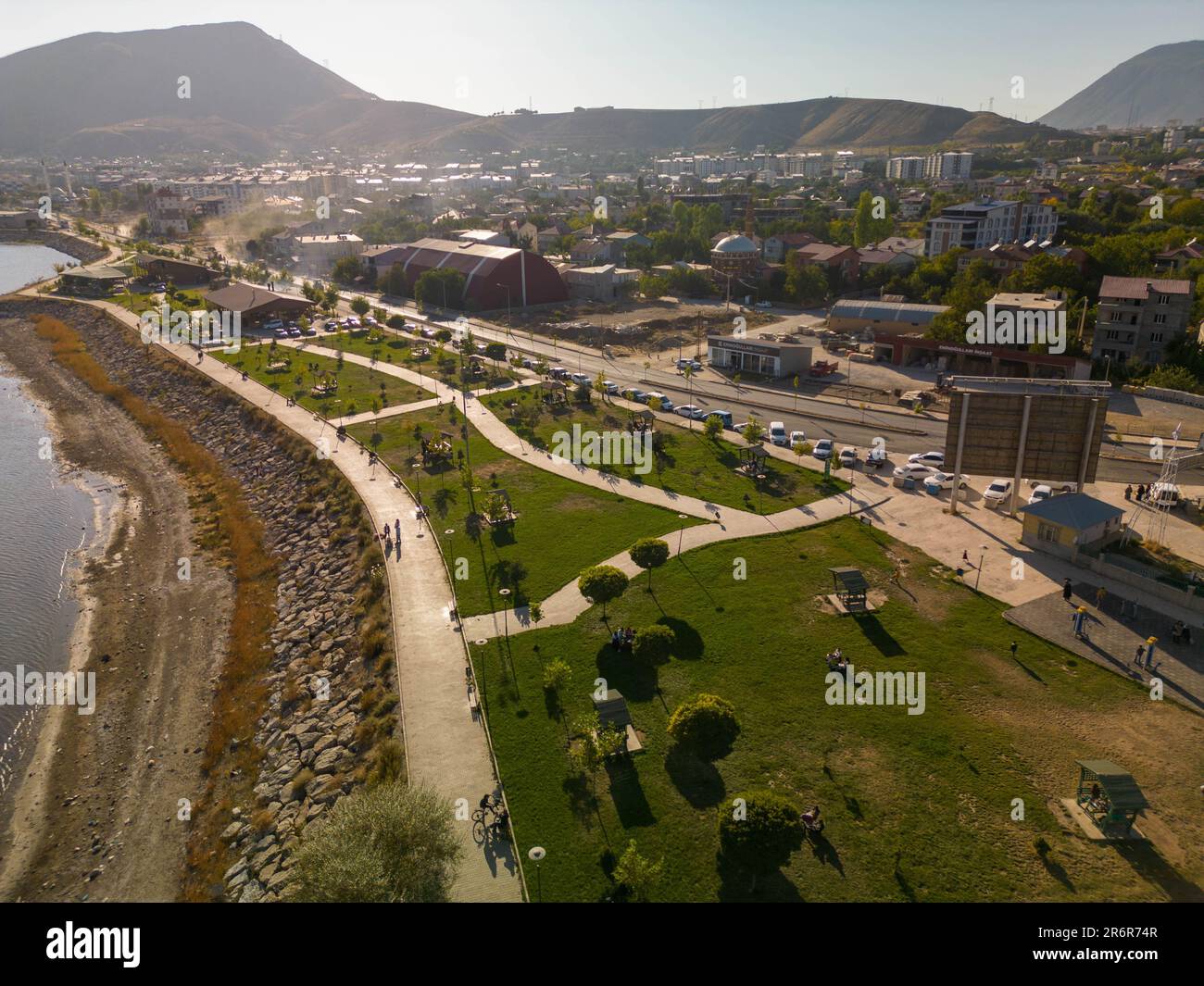 An aerial view of a seaside road in Turkey, snaking along a beach with ...
