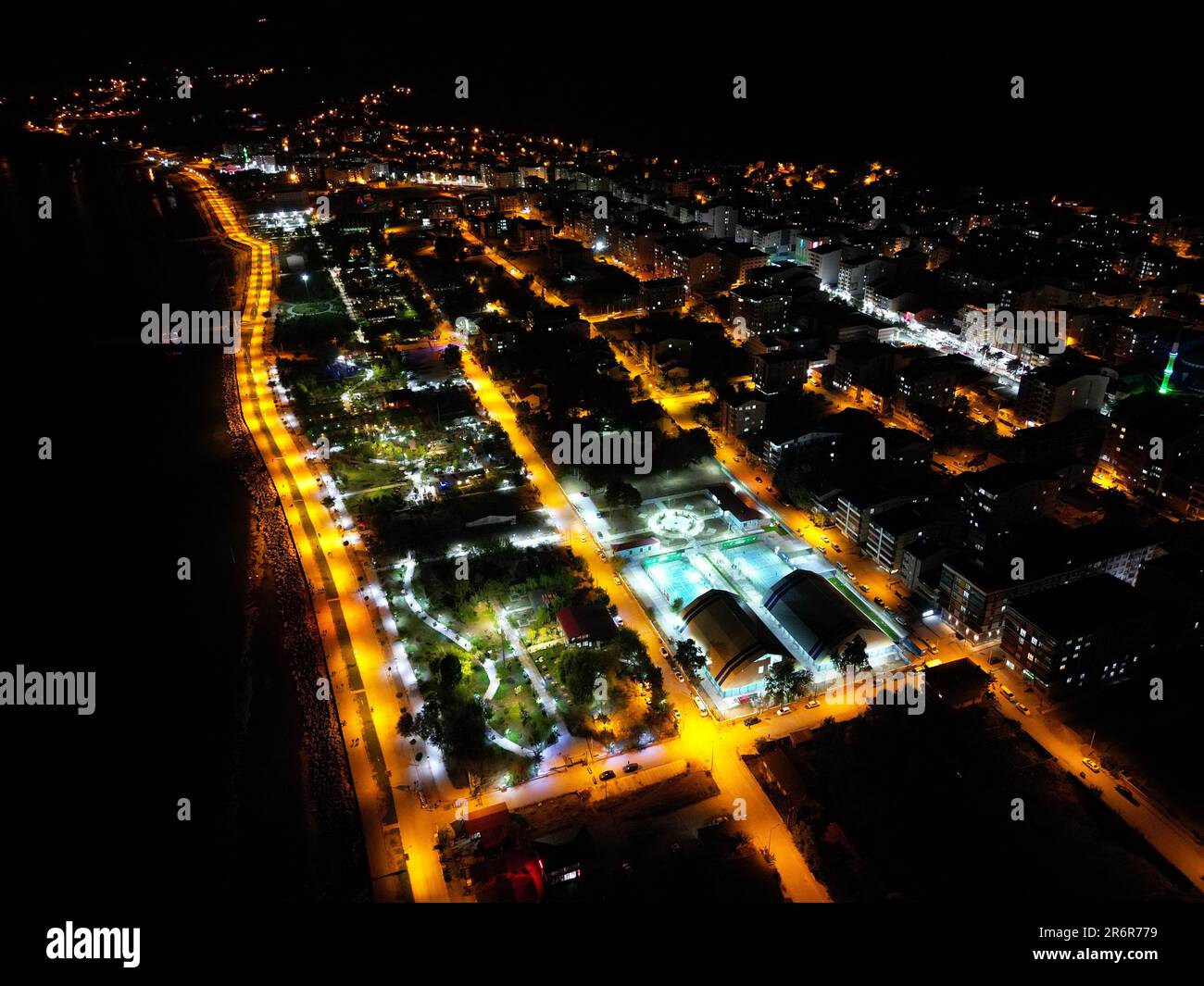 This aerial image captures the stunning night skyline of the city of ...
