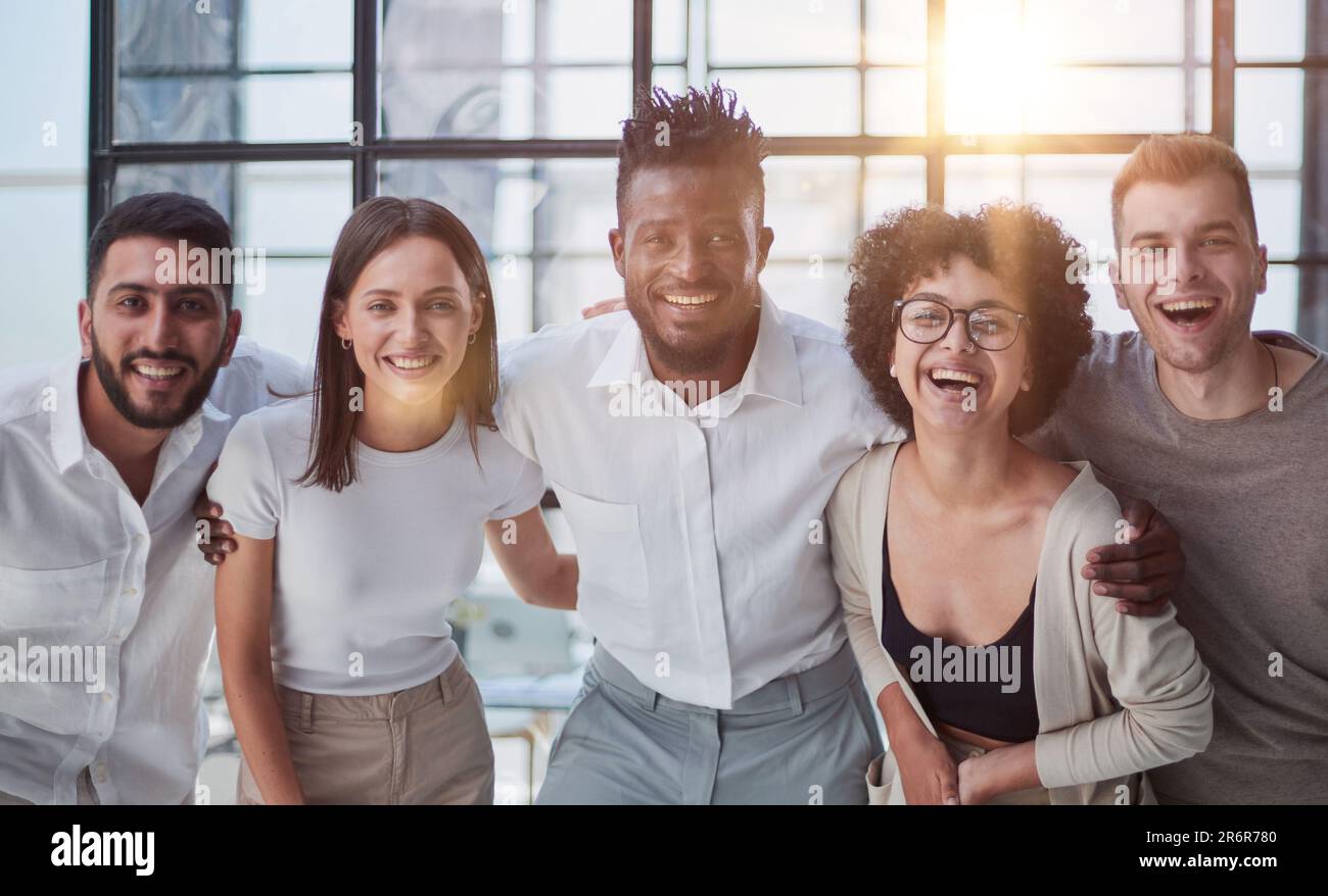 Smiling professional business leaders and employees group team portrait ...