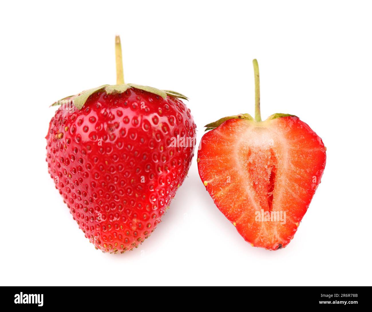 One and half strawberries. Isolated on a white background Stock Photo ...