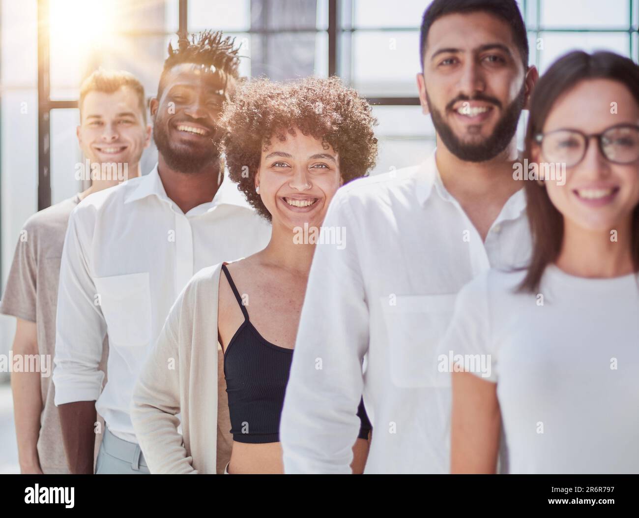 Smiling professional business leaders and employees group team portrait ...