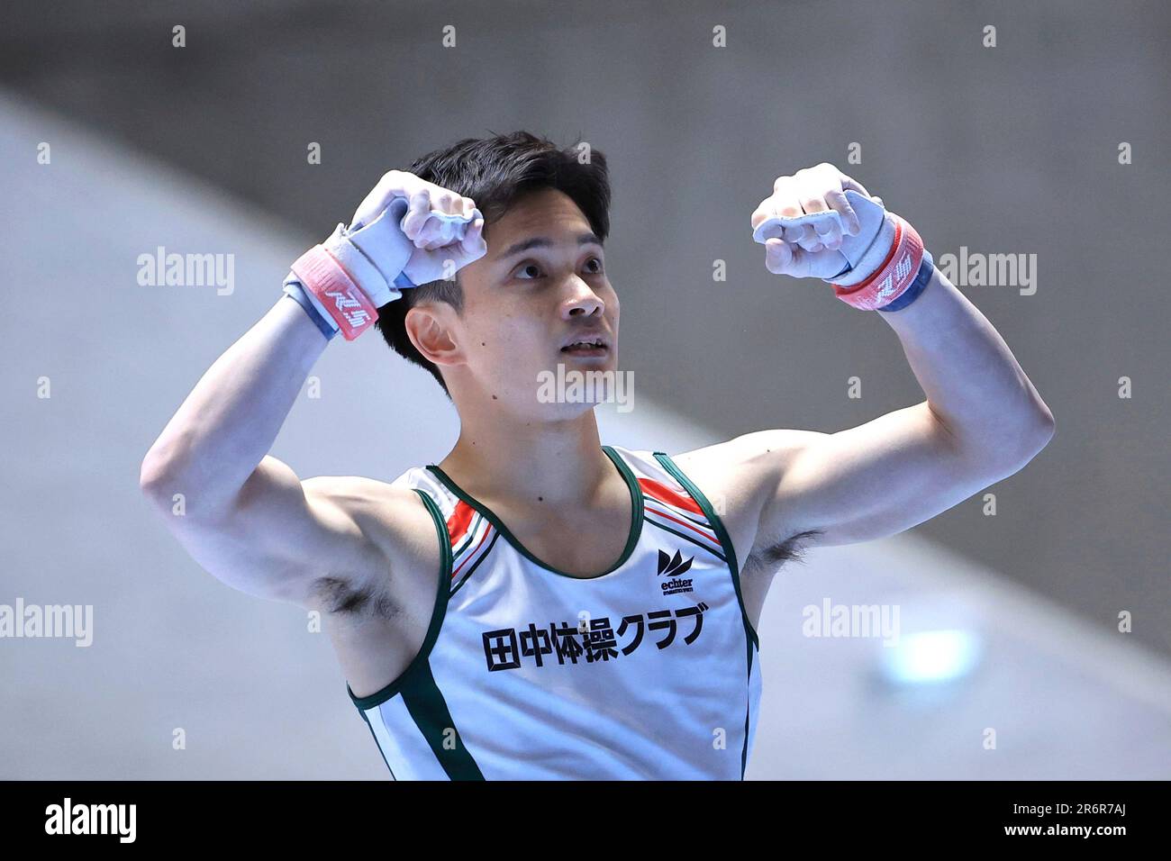 Yusuke Tanaka reacts during men's horizontal bar of All-Japan Artistic Gymnastics Championships ...
