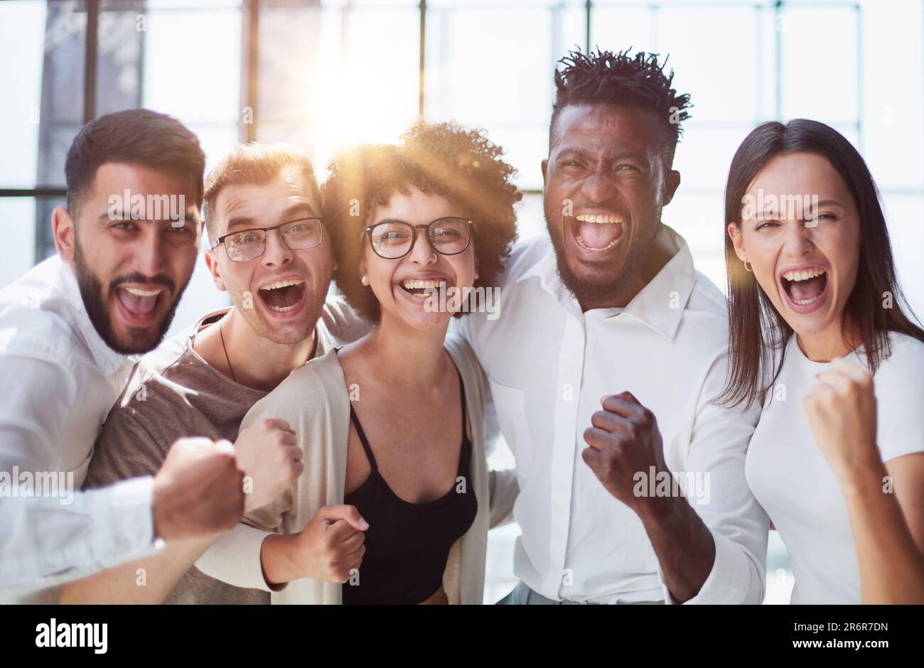 Smiling professional business leaders and employees group team portrait ...