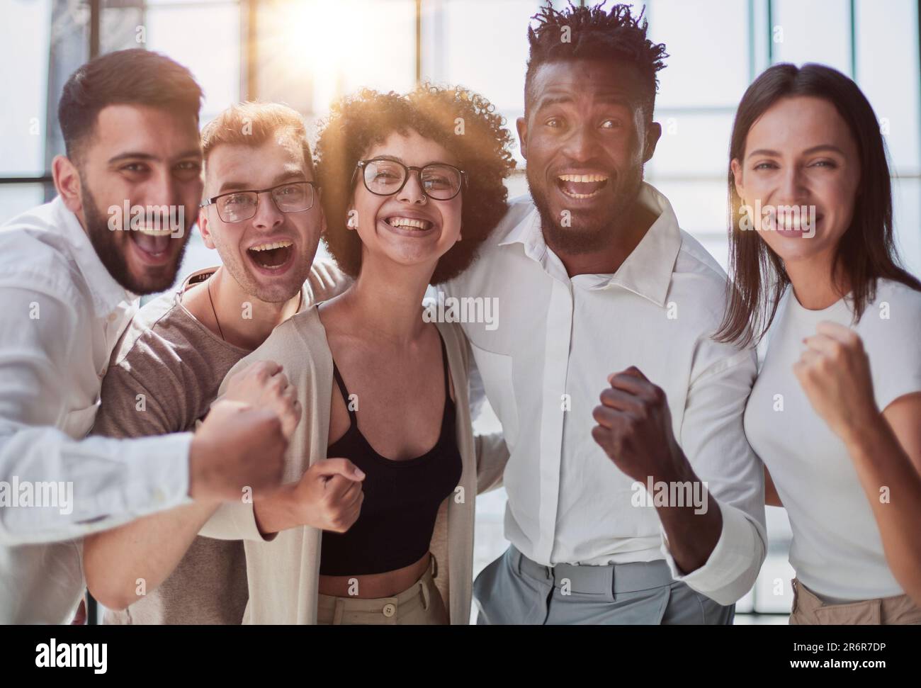 Smiling professional business leaders and employees group team portrait ...