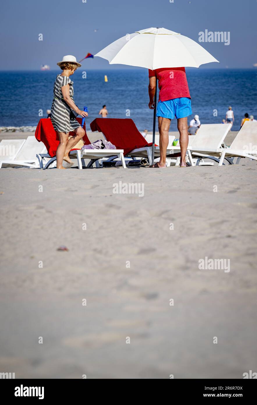 HOEK VAN HOLLAND - Bathers on the beach of Hoek van Holland. There are ...