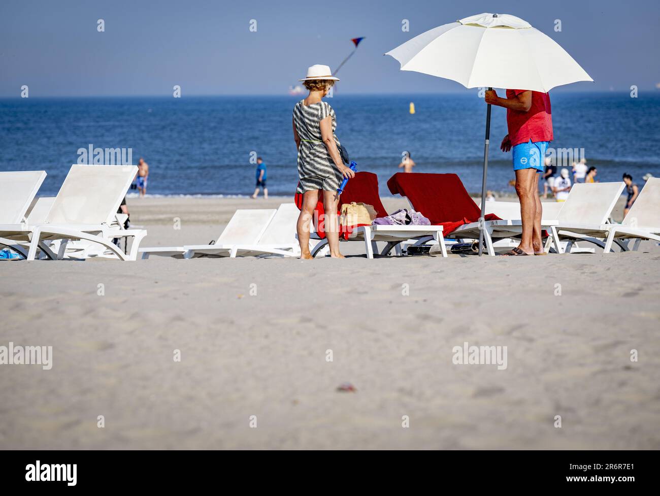 HOEK VAN HOLLAND - Bathers on the beach of Hoek van Holland. There are ...