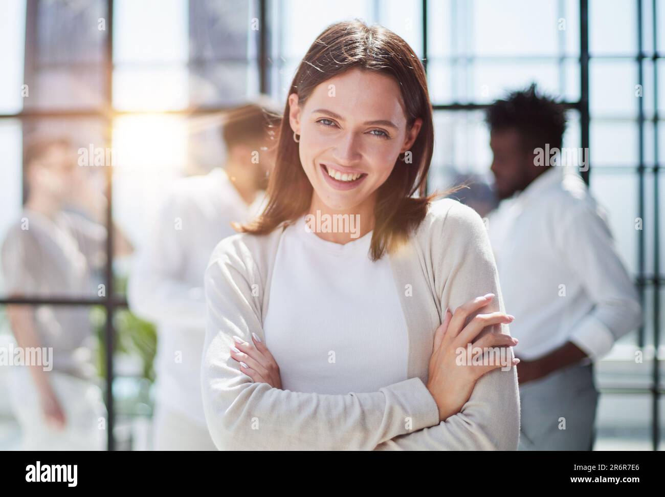 Smiling professional business leaders and employees group team portrait ...