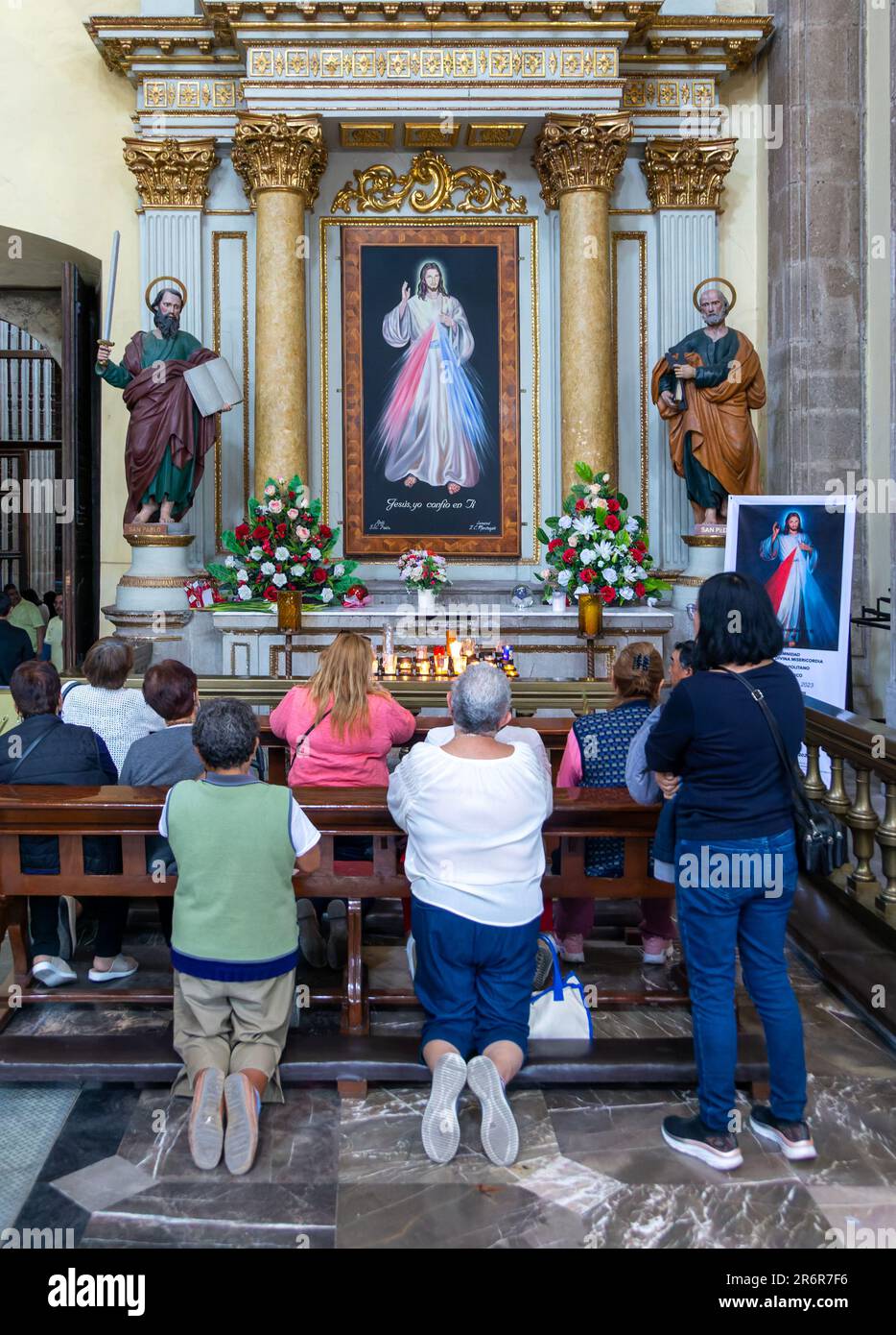 People praying at altar inside cathedral church, Catedral Metropolitana ...