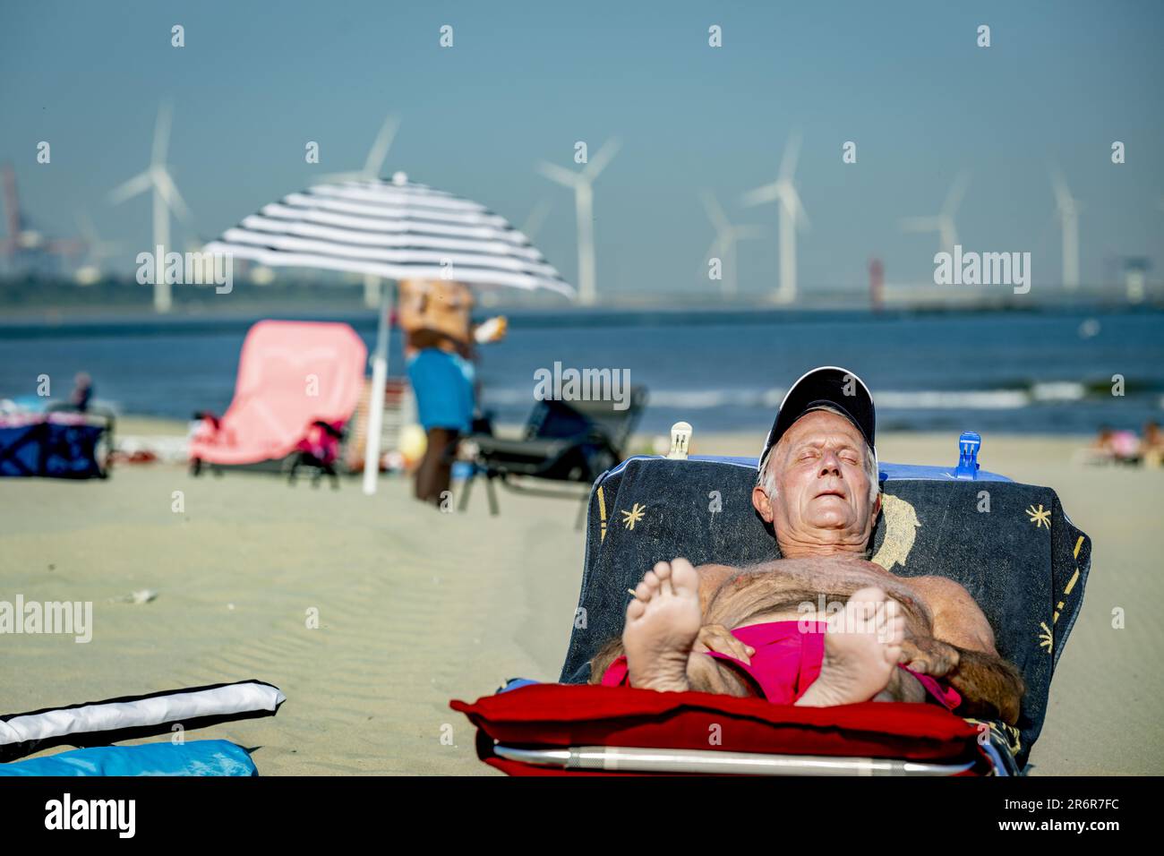 HOEK VAN HOLLAND - Bathers on the beach of Hoek van Holland. There are ...