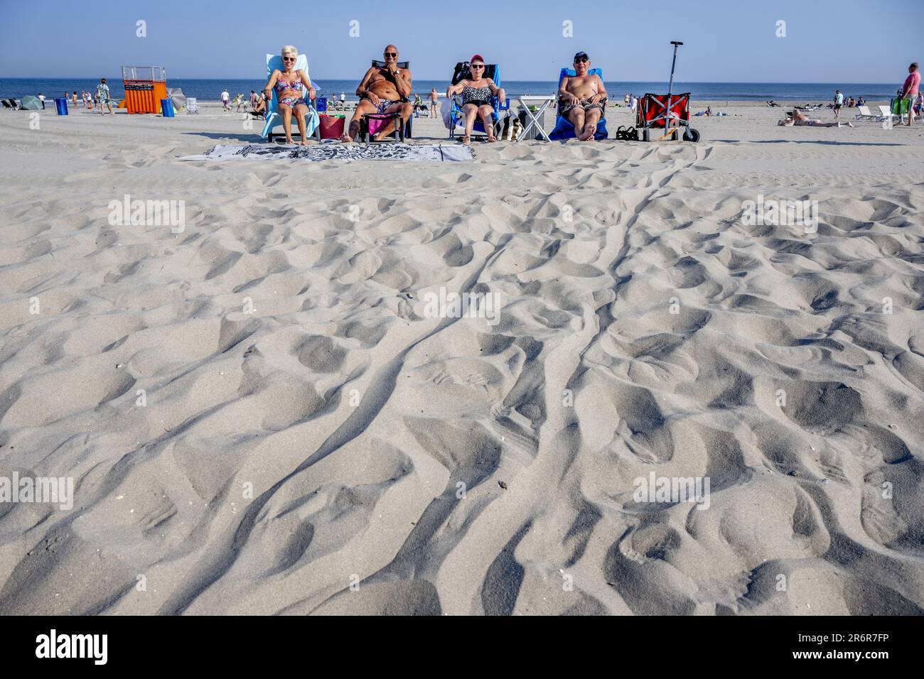 HOEK VAN HOLLAND - Bathers on the beach of Hoek van Holland. There are ...