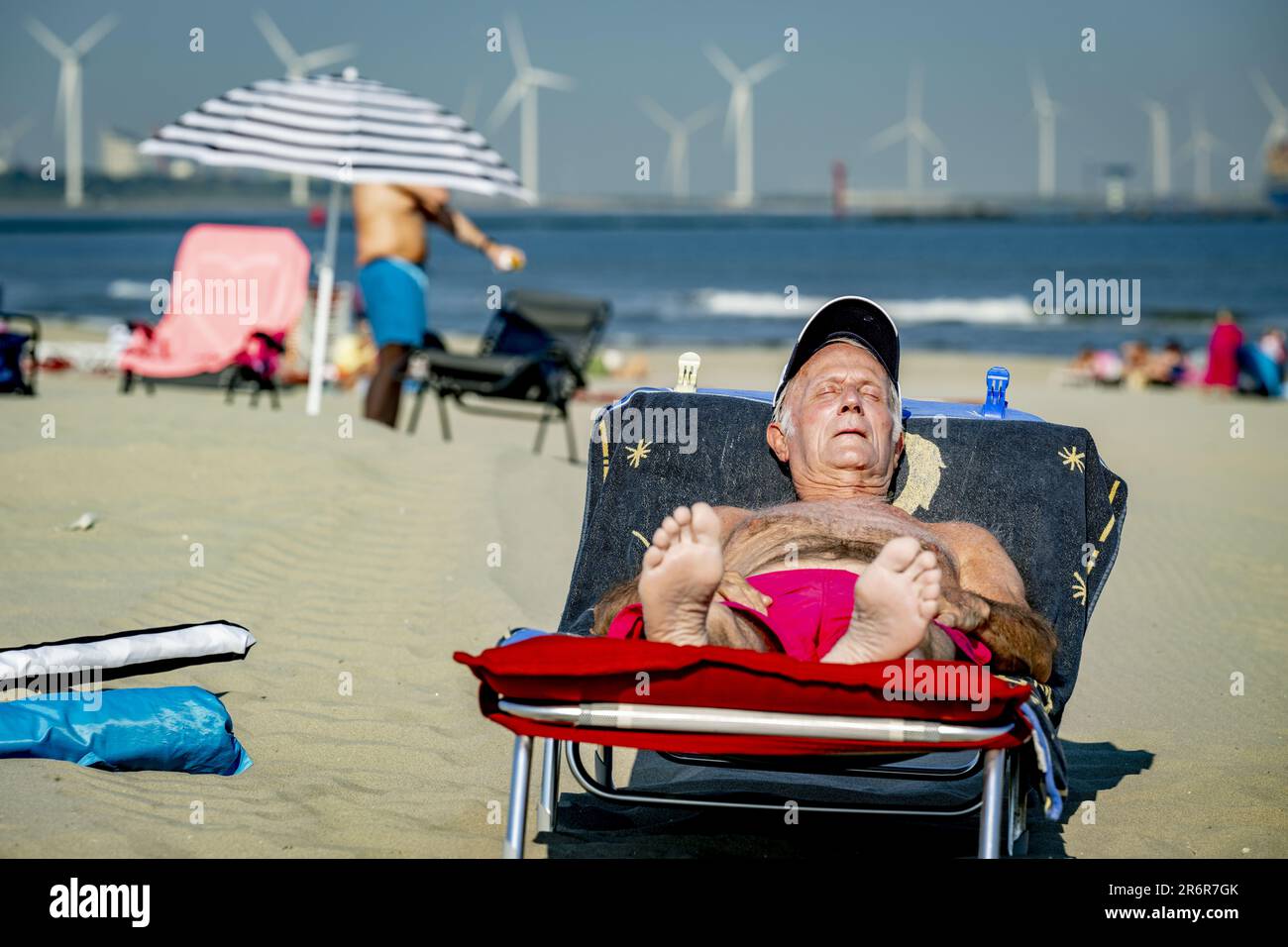 HOEK VAN HOLLAND - Bathers on the beach of Hoek van Holland. There are ...