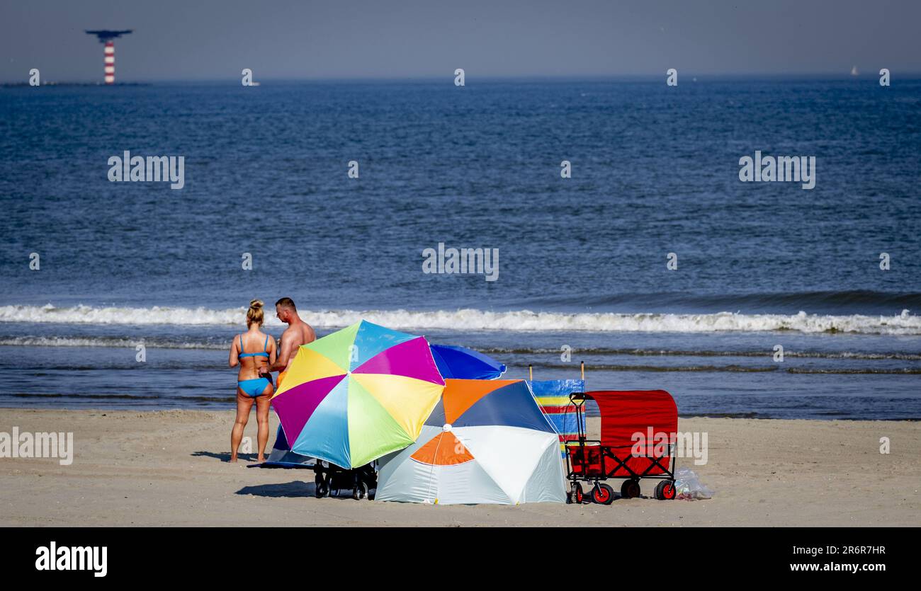 HOEK VAN HOLLAND - Bathers on the beach of Hoek van Holland. There are ...