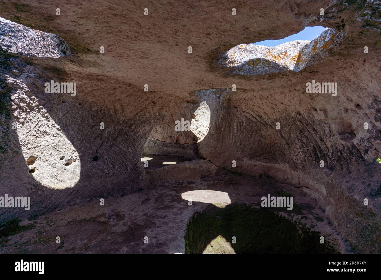 Ancient cave city. Inside the cave, view from the window Stock Photo ...