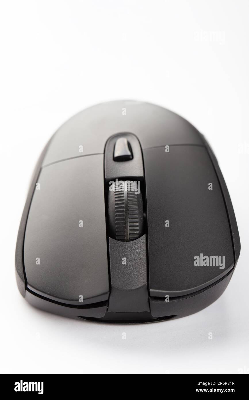 Black wireless computer mouse on a white background. Office equipment ...