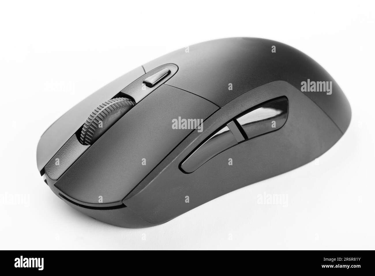 Black wireless computer mouse on a white background. Office equipment ...