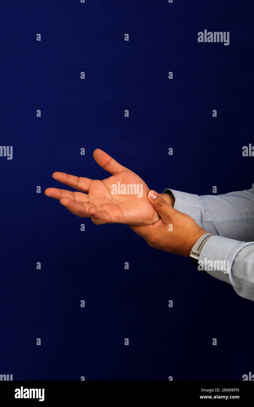 Dark-haired 40-year-old Latino man suffers from pain, numbness and ...