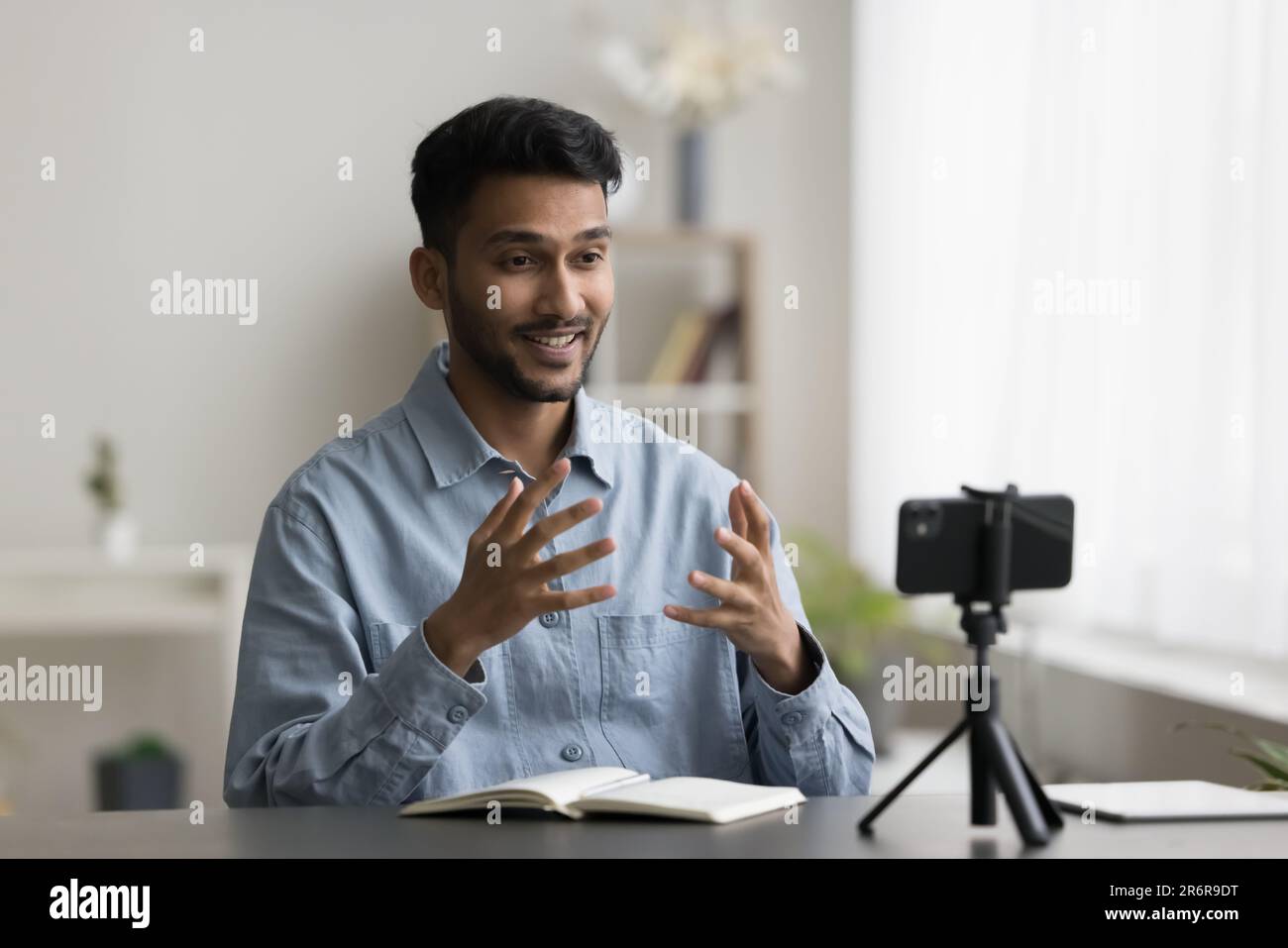 Indian male blogger recording video hi-res stock photography and images ...