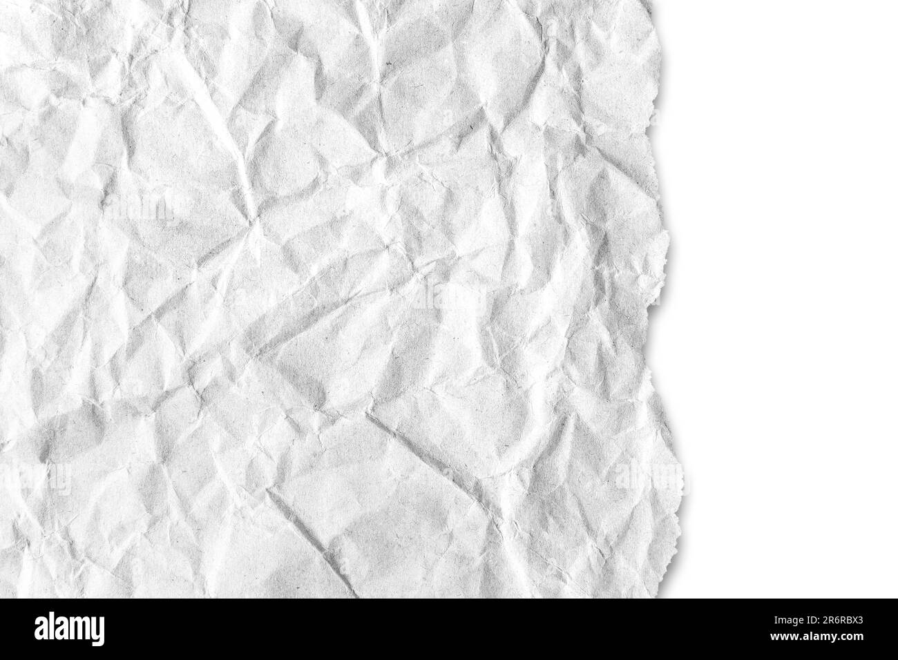 Recycled crumpled white paper texture with a torn edge isolated on ... Recycled crumpled white paper texture with a torn edge isolated on ...