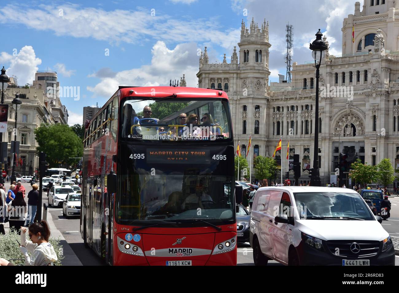 June 2023: Walking around Madrid. Tourist bus through Madrid streets ...