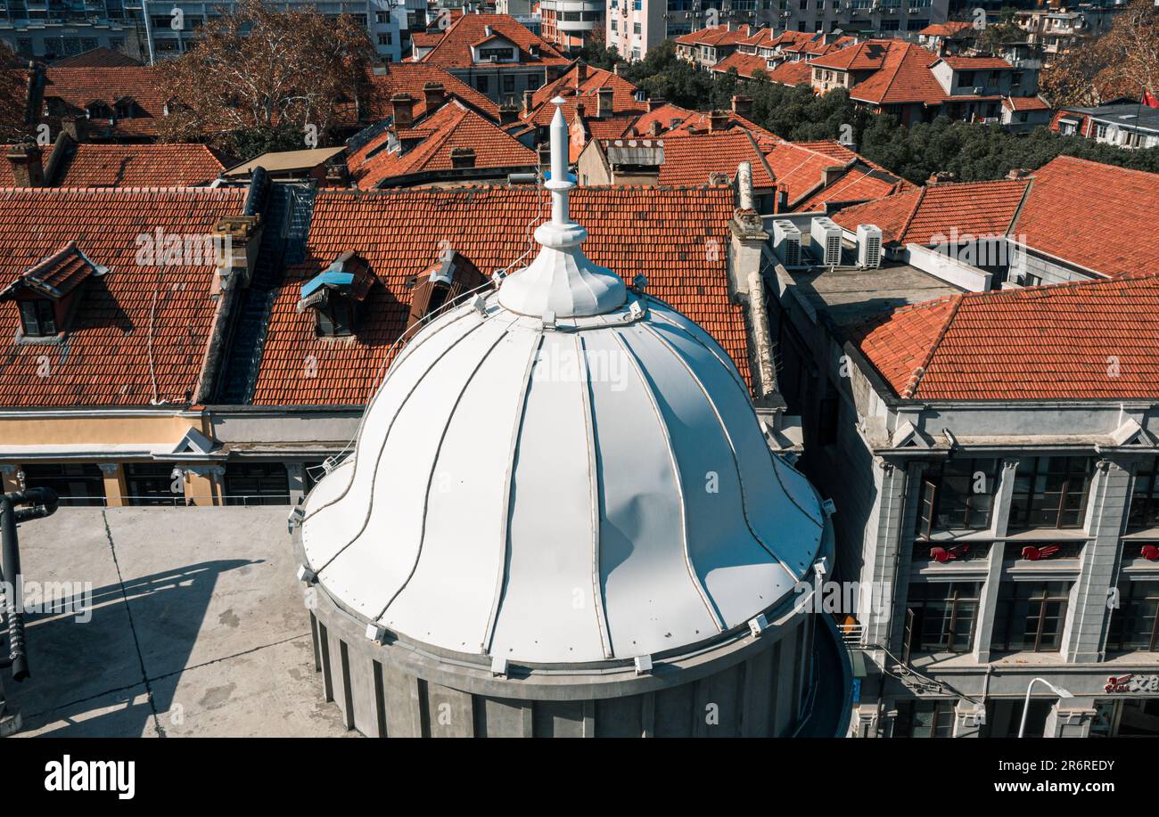 An aerial view of a vibrant urban landscape: century-old historical ...