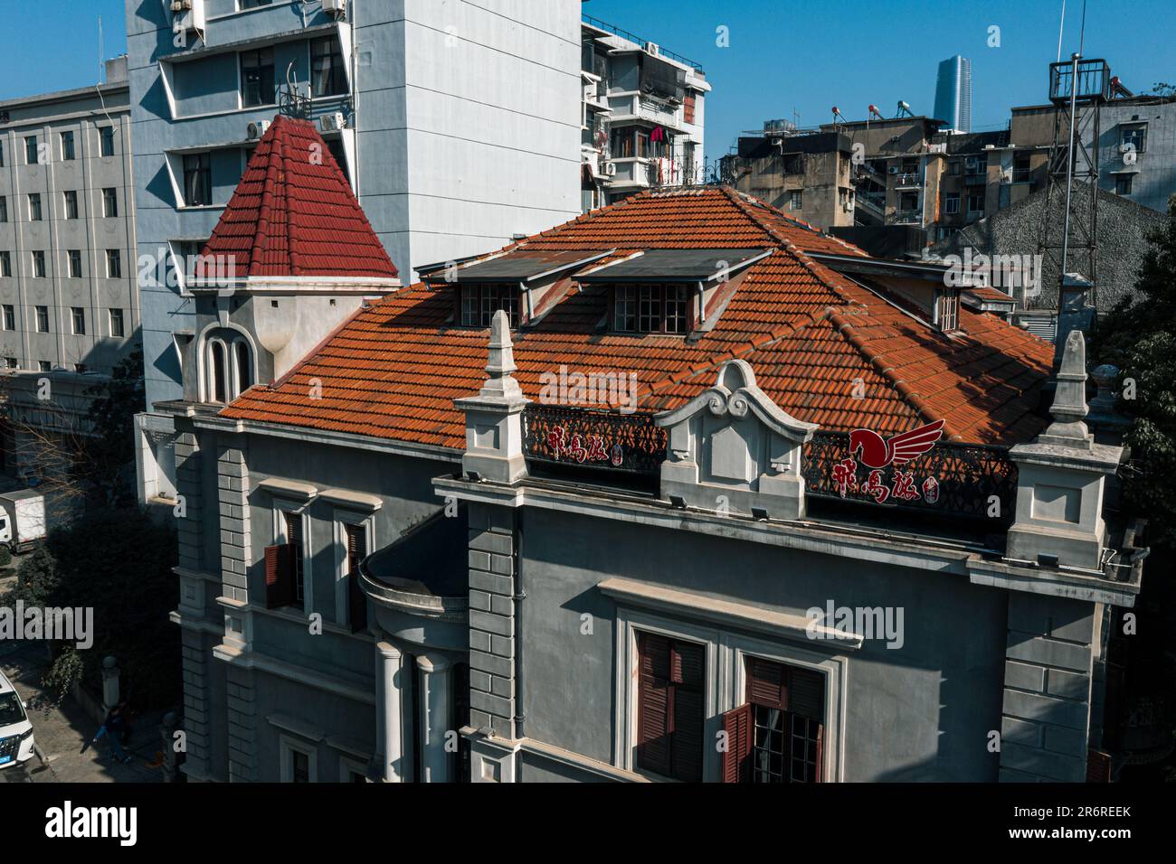 An aerial view of a vibrant urban landscape: century-old historical ...