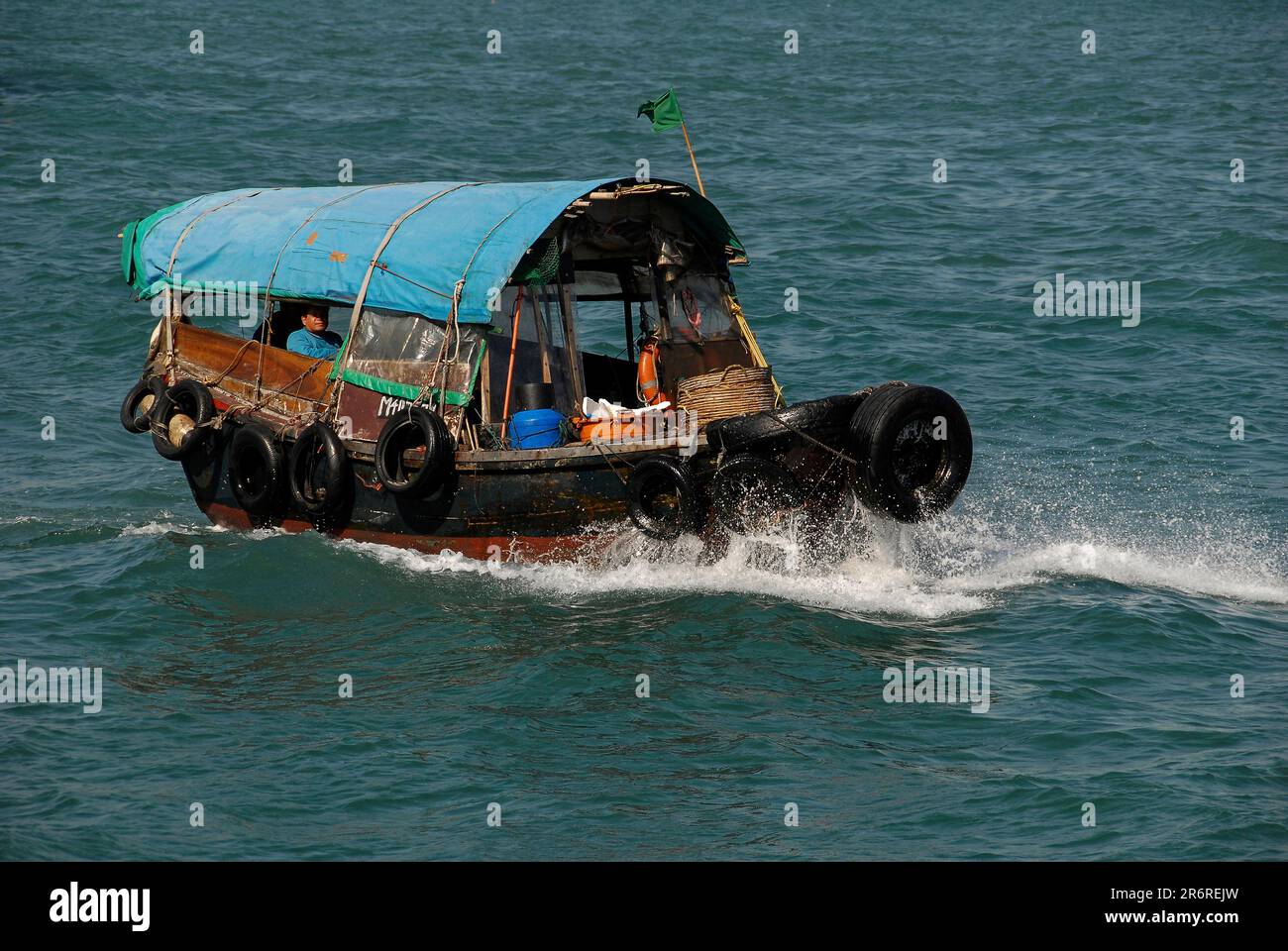 Sampan, a traditional flat-bottomed fishing boat made of wood, in the ...