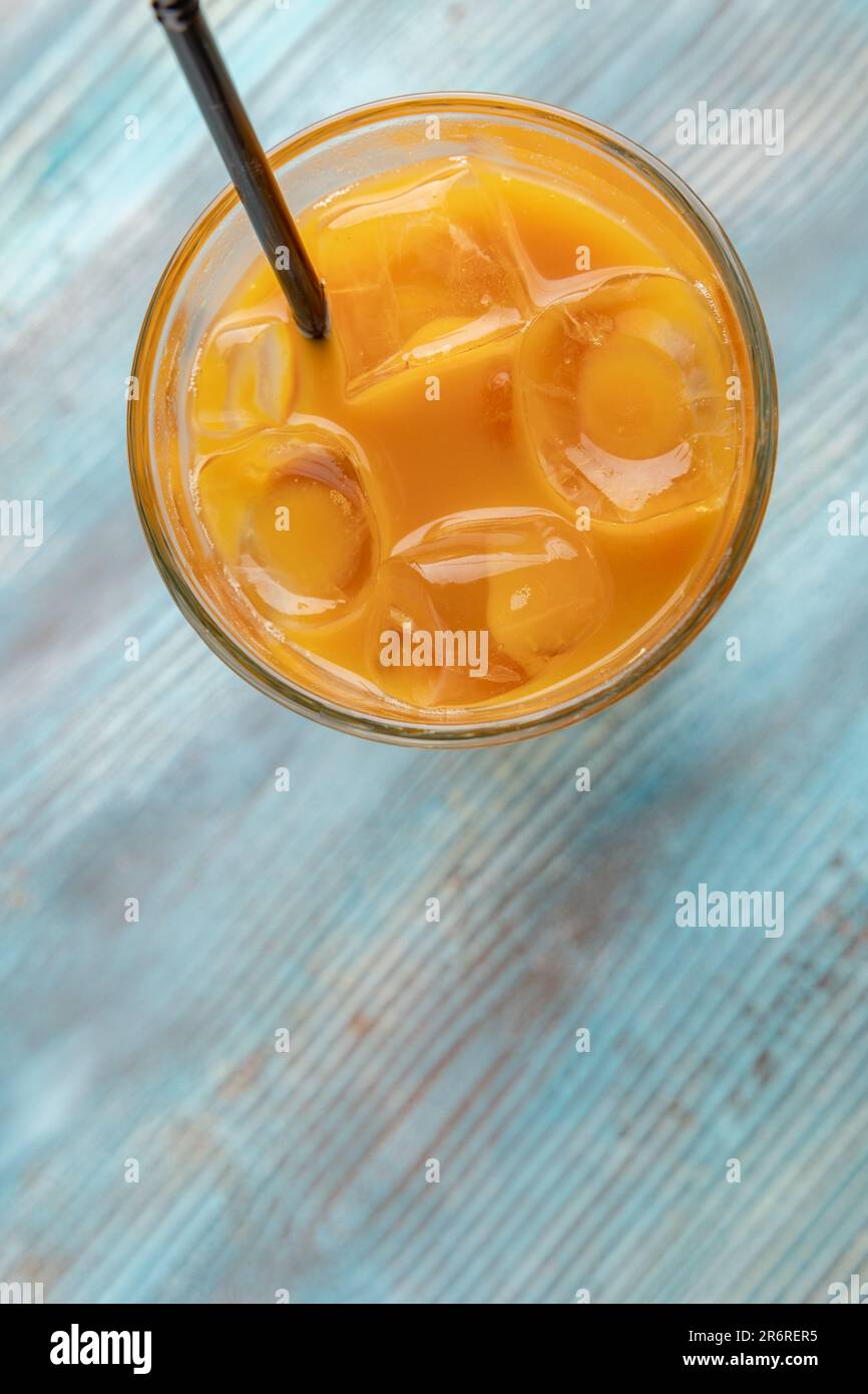 Glass of iced Orange Juice, Top view. Orange Granizado. Refreshing ...