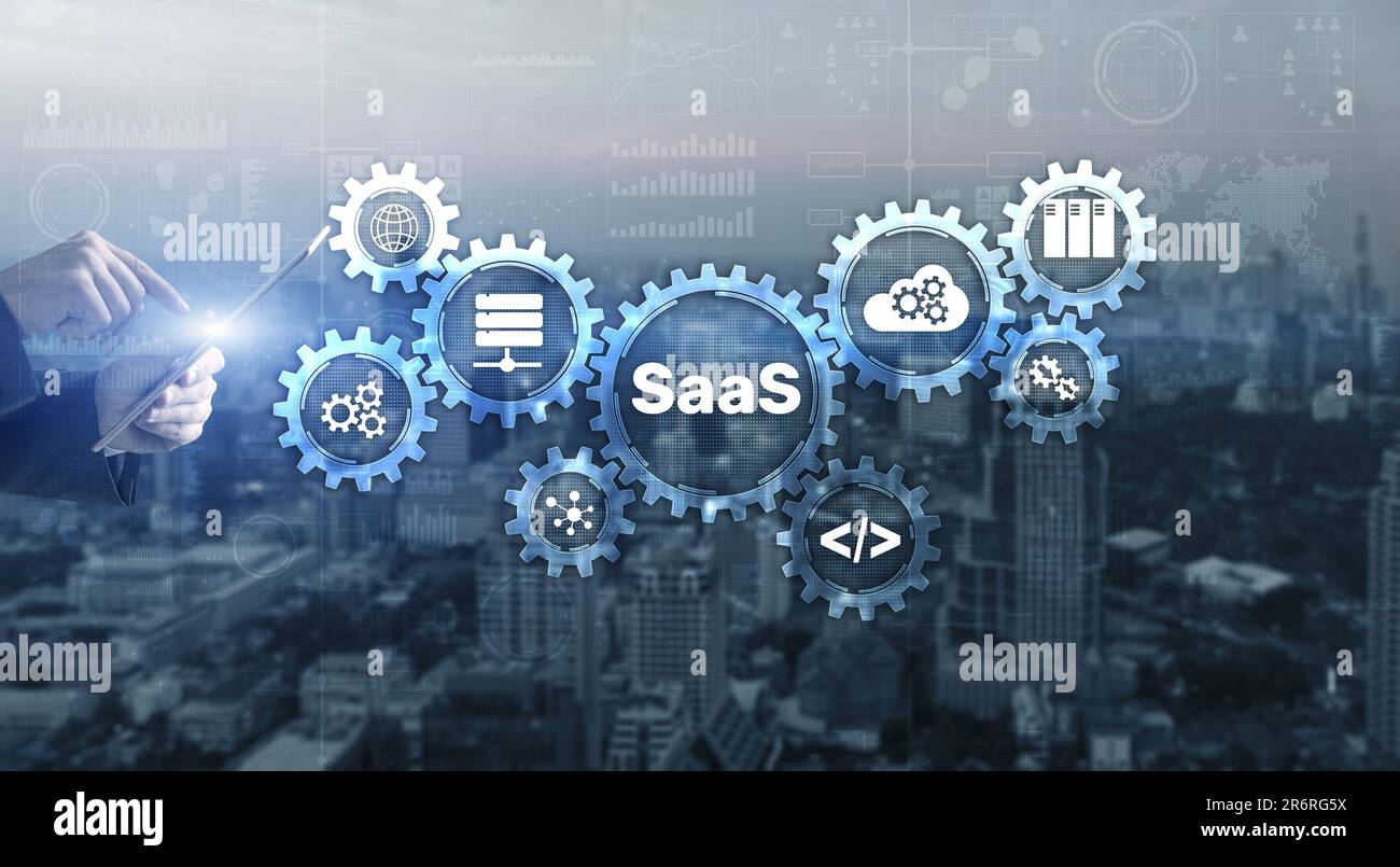 SaaS Software as a Service concept with hand pressing text Stock Photo - Alamy