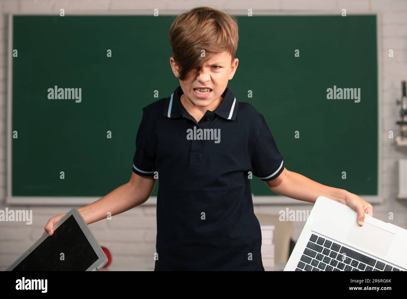Angry school kid in class hi-res stock photography and images - Alamy