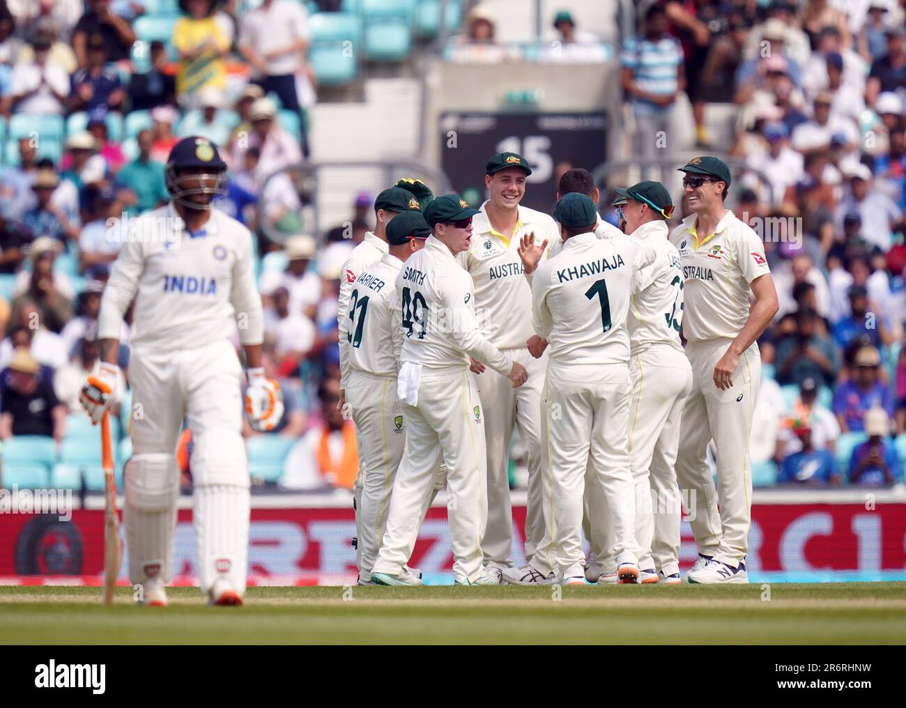 Australia's Scott Boland celebrates taking the wicket of India's ...