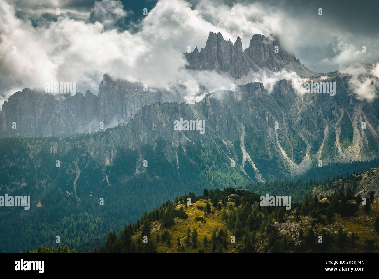 Foggy rock formations on a rainy day in the Dolomites, Italy, Europe ...