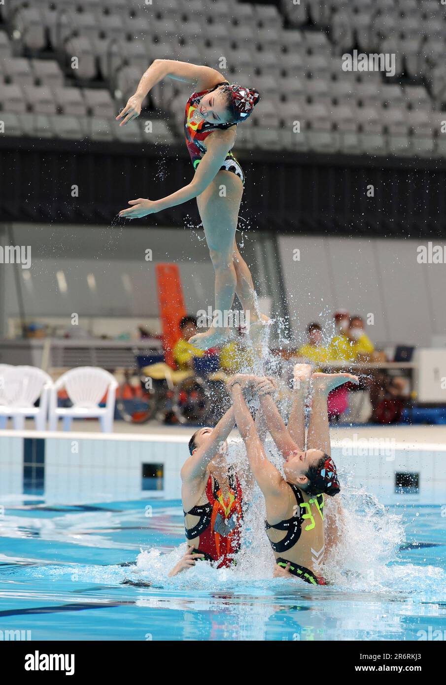 Japan's national team swimmers perform Acrobatic Routine during an ...