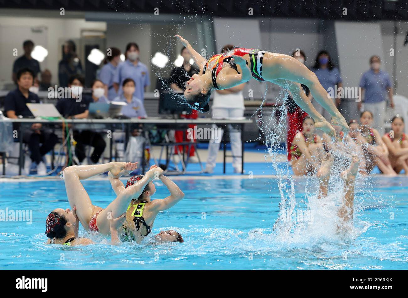 Japan's national team swimmers perform Acrobatic Routine during an ...