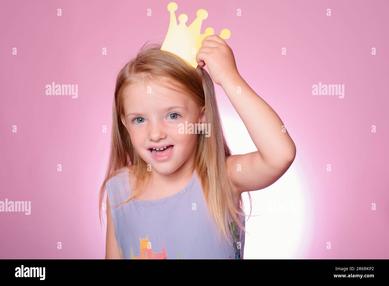 Pretty child preparing for a costume party. Celebrating brightful ...