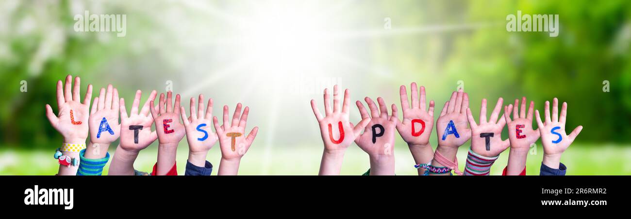 Children Hands Building Word Latest Updates, Grass Meadow Stock Photo ...