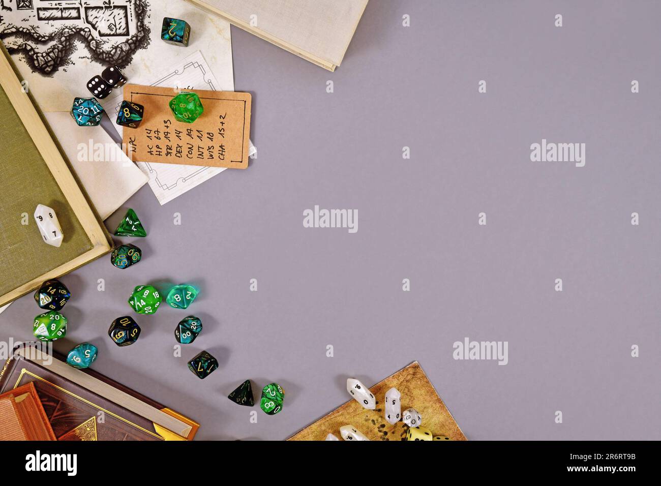 Tabletop roleplaying flat lay with RPG and game dices, rule book, notes ...