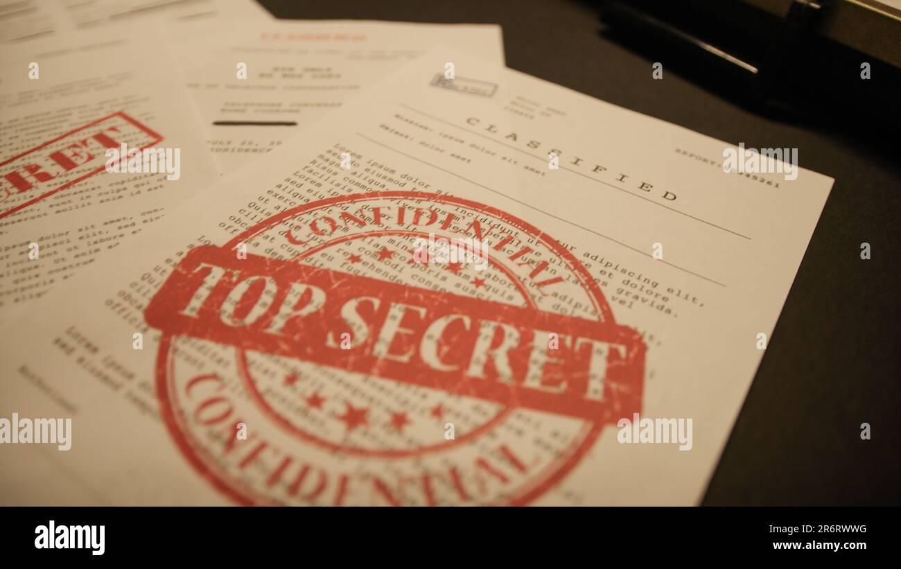 Top secret document hands hi-res stock photography and images - Alamy