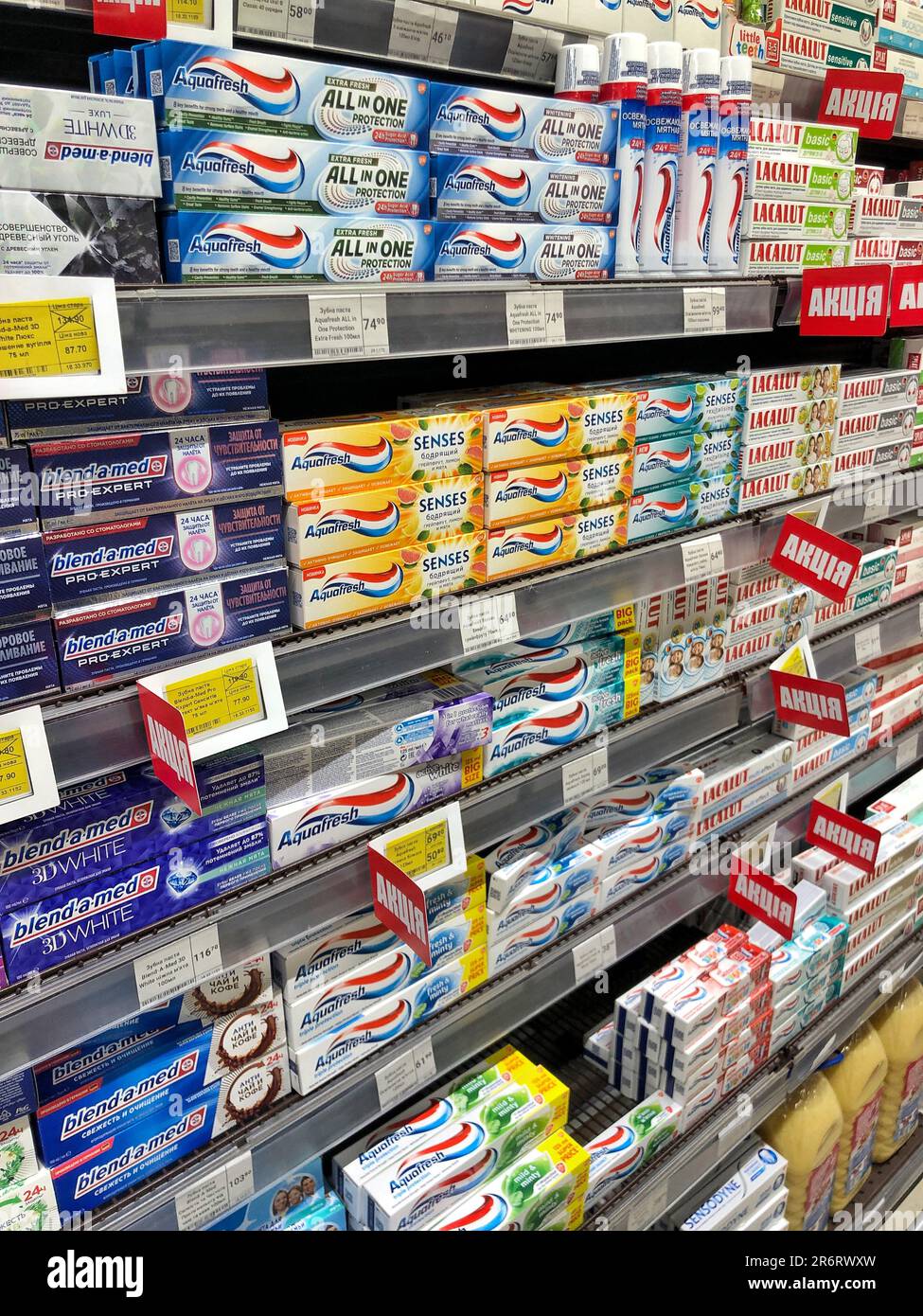 25.03.2023 Ukraine, Kharkiv, a shelf in a supermarket with toothpaste ...