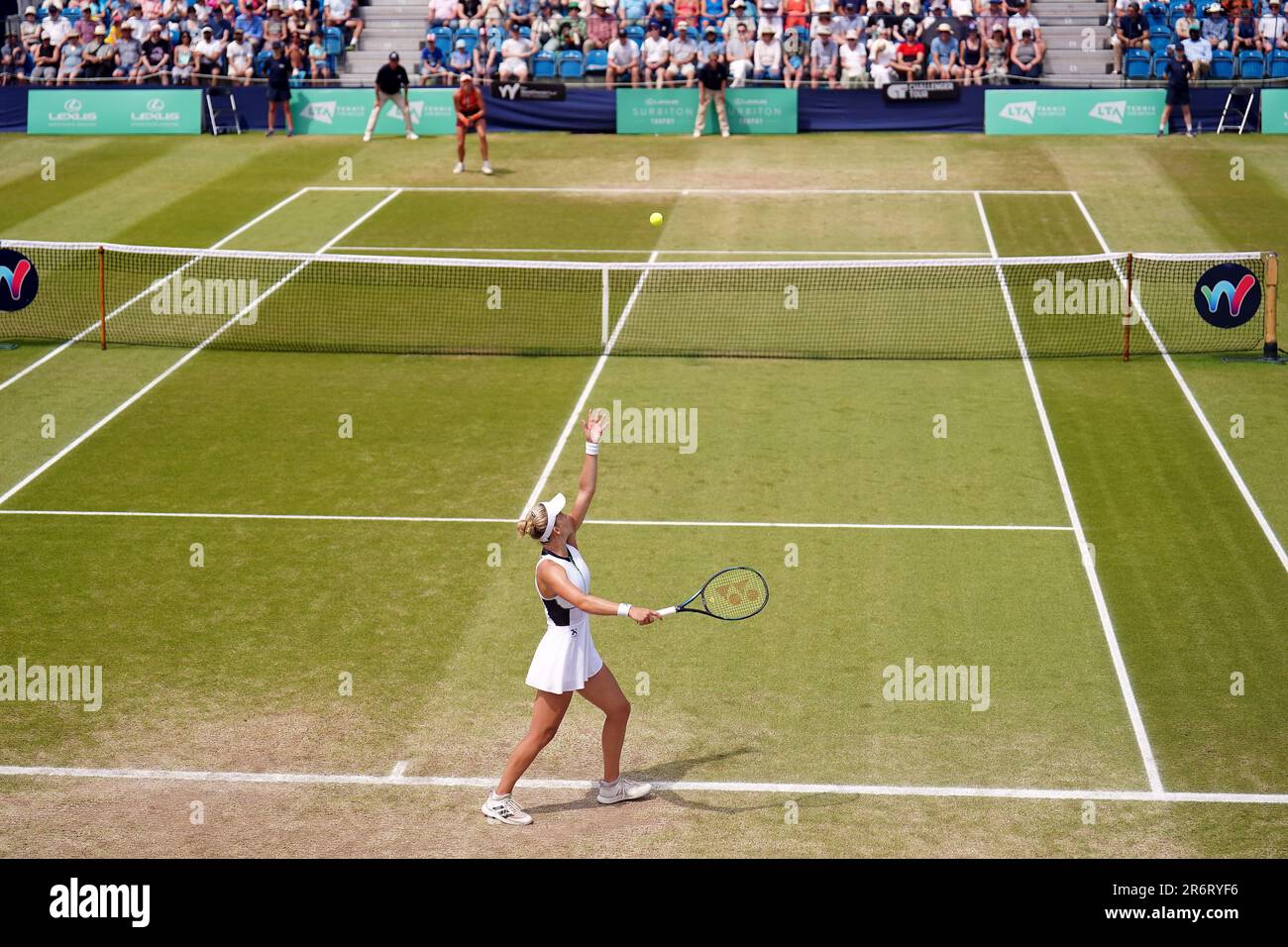Katie Swan in action during her final against Yanina Wickmayer (top) on ...