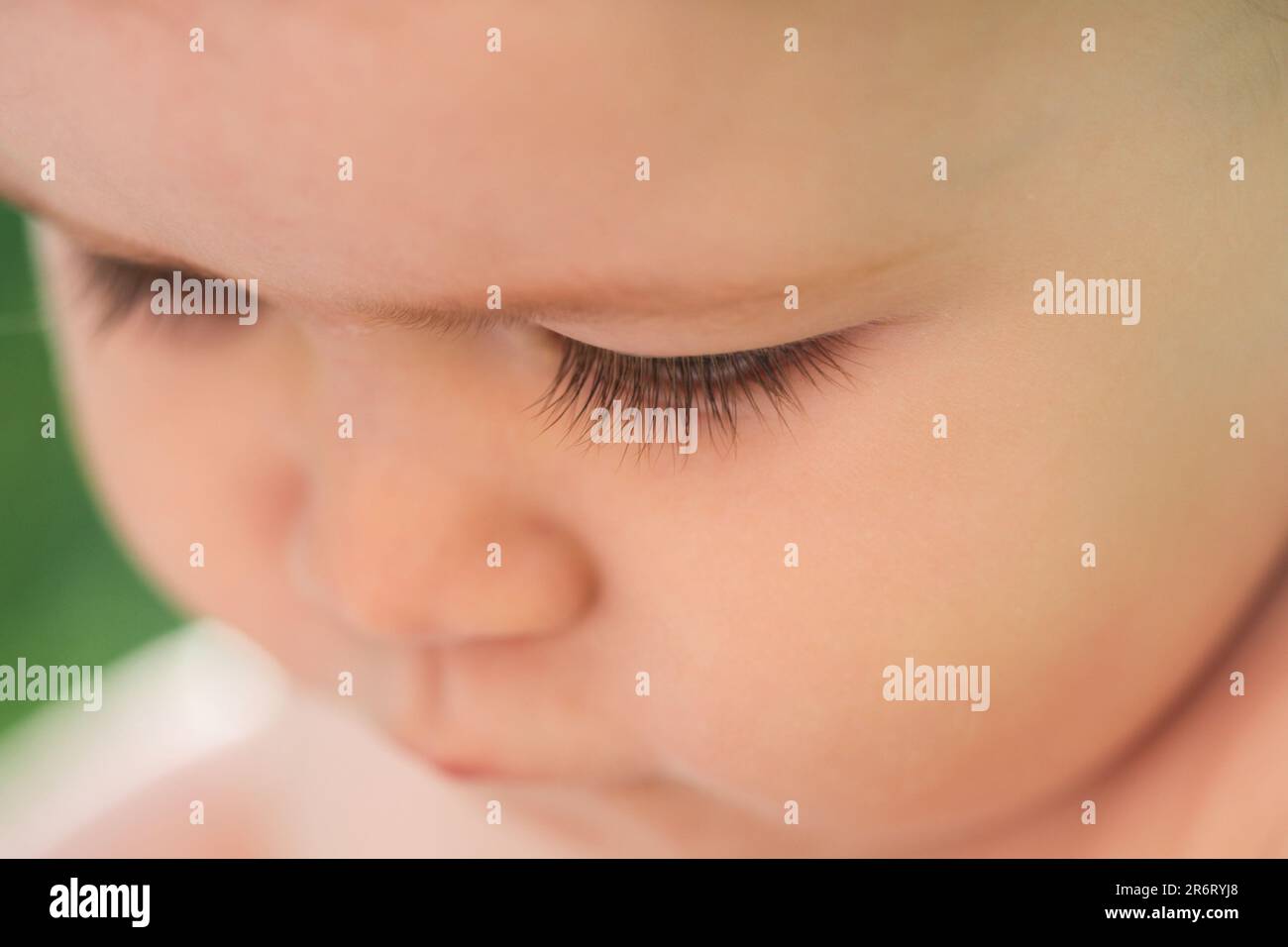 Macro eyelash. Portrait of little baby boy, cropped face with long ...