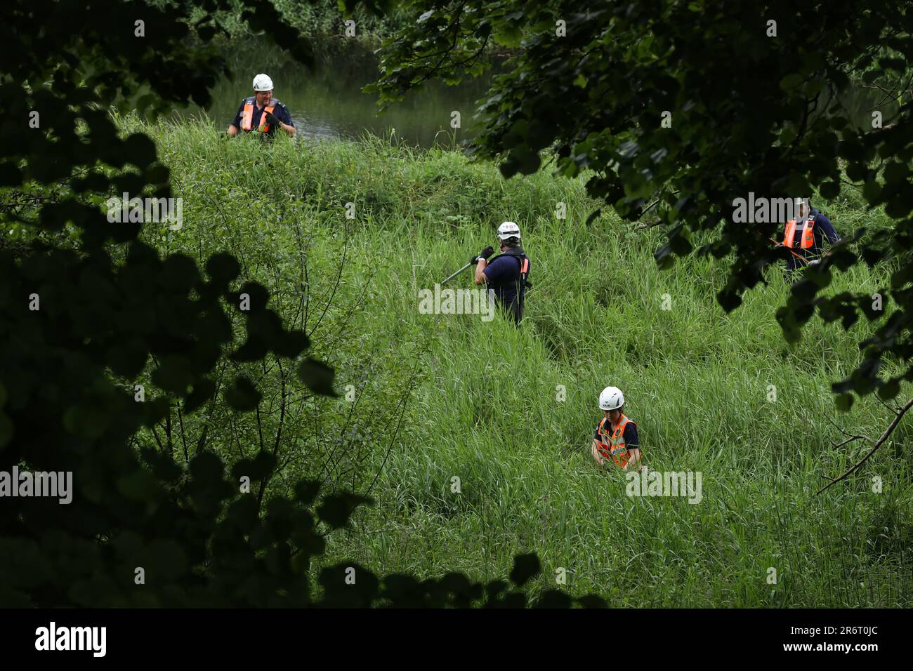 Community Rescue Service volunteers in thick undergrowth near the River ...