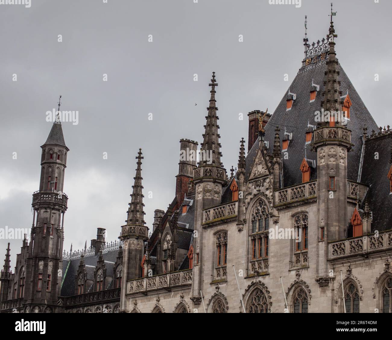 An idyllic scene of ancient stone structures with multiple windows and ...