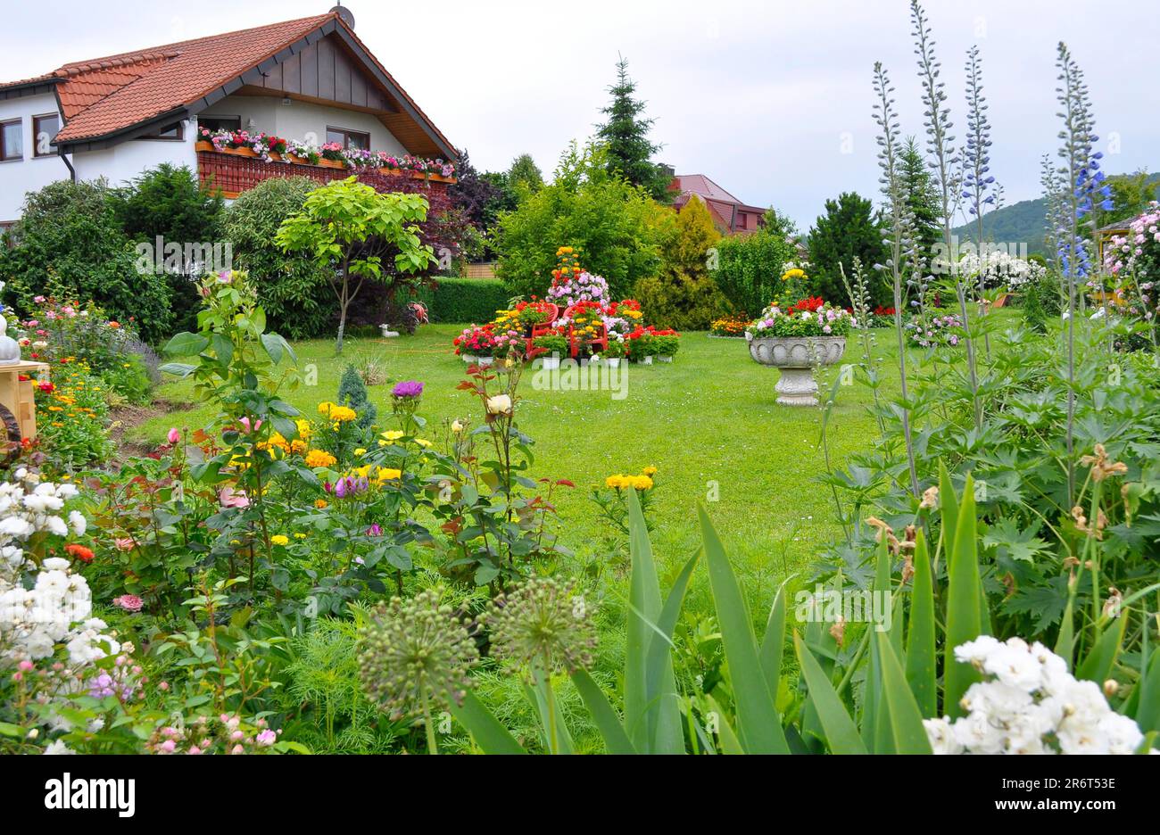 Flower pyramid in the garden Stock Photo - Alamy
