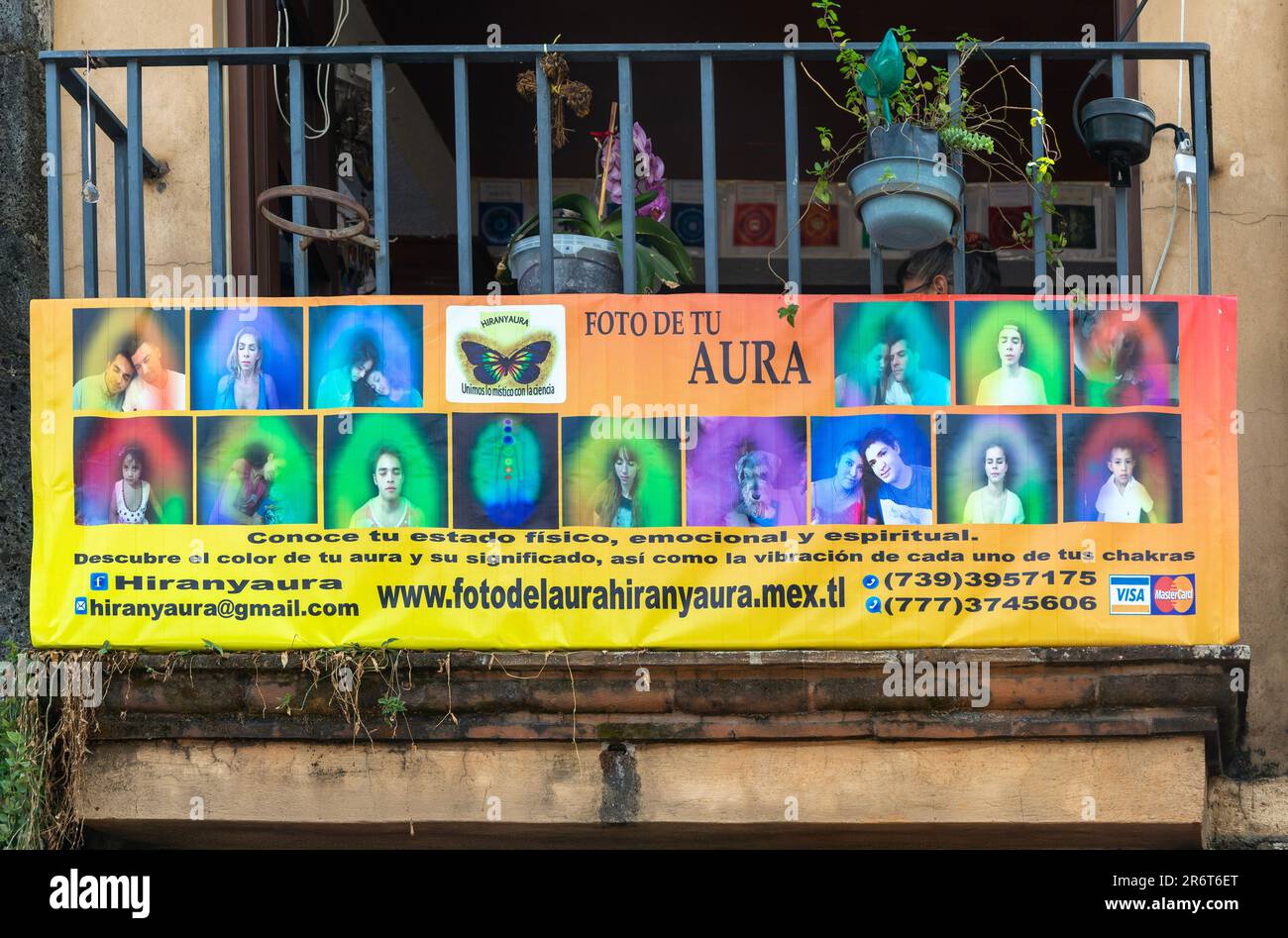 Sign advertising poster for aura photos, Tepoztlán, State of Morelos ...