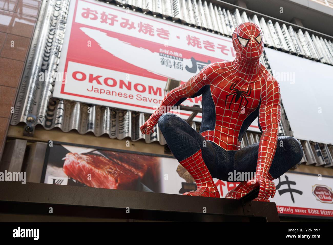 March 17, 2023, Osaka, Japan: A spiderman statue outside an okonomiyaki ...