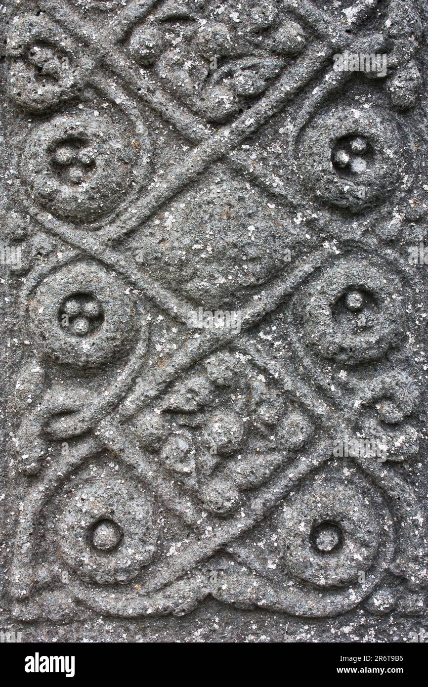 Ancient stone decorated with celtic motives, on Iona Isle, Scotland ...