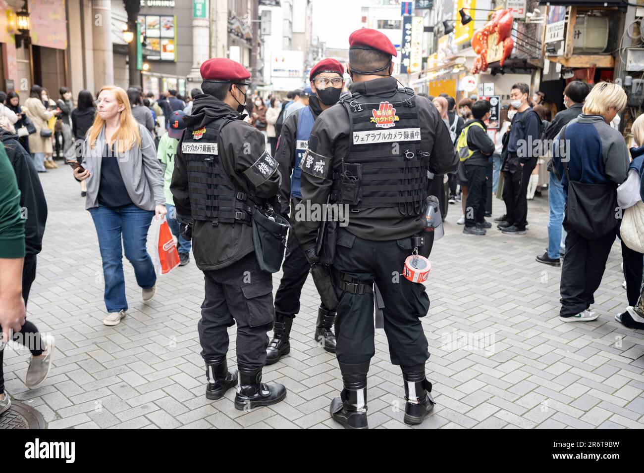 March 17, 2023, Osaka, Japan: Private security guards in black uniforms ...