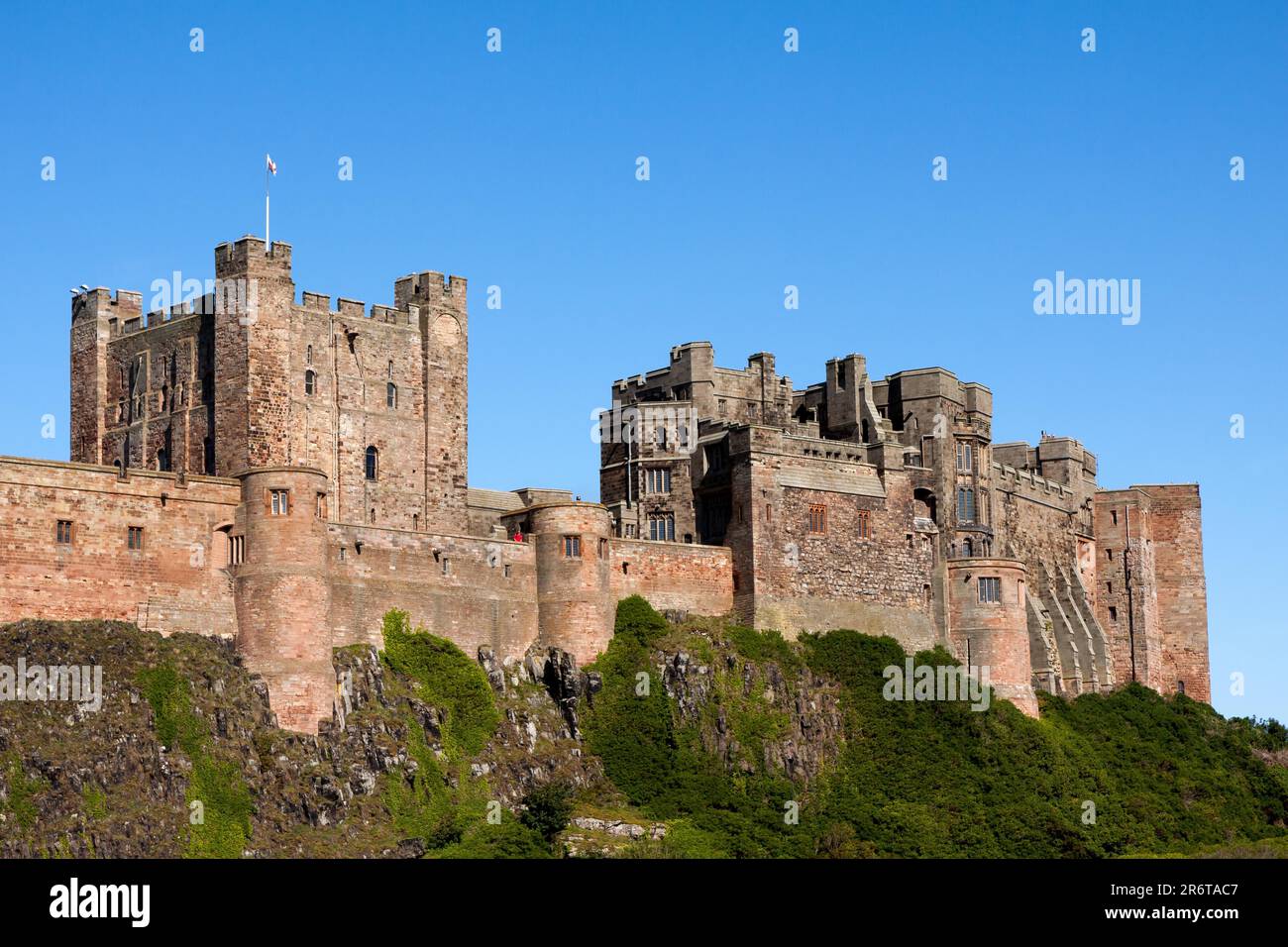 Bamburgh village with view of the castle hi-res stock photography and ...